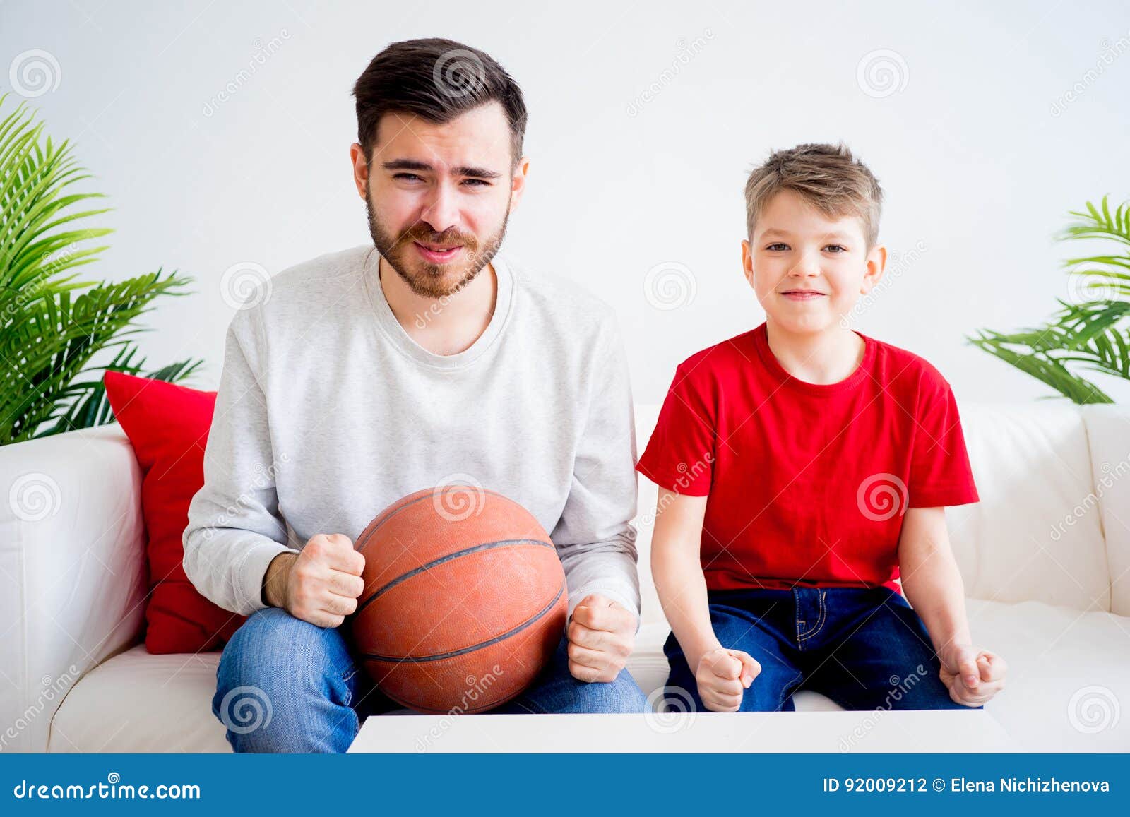 Father and Son Watching Basketball Stock Photo - Image of rest, relaxed ...