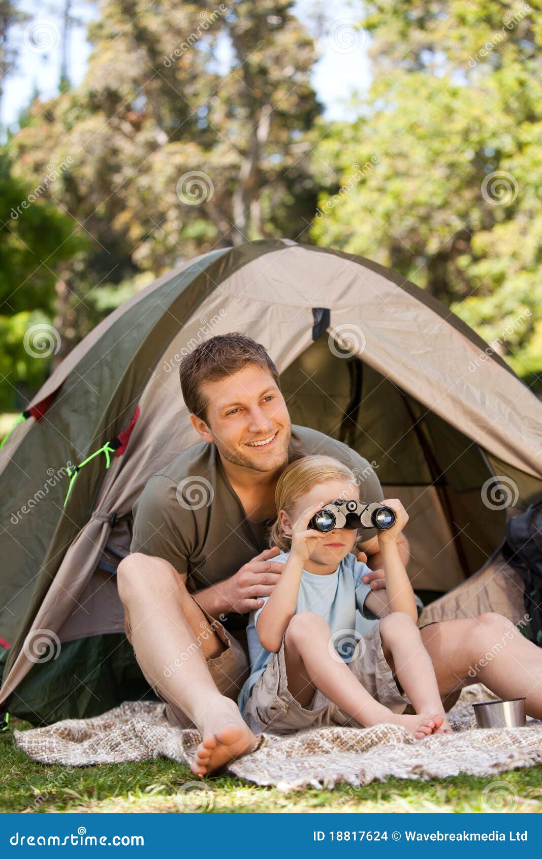 Father and Son Watching Birds Stock Photo - Image of family, campsite ...