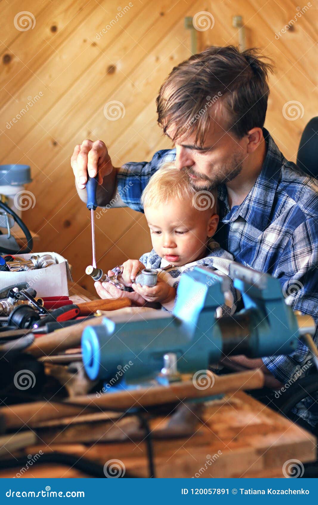 Father and Son in Workshop Repairing Some Stuff. Cute Boy Exploring ...