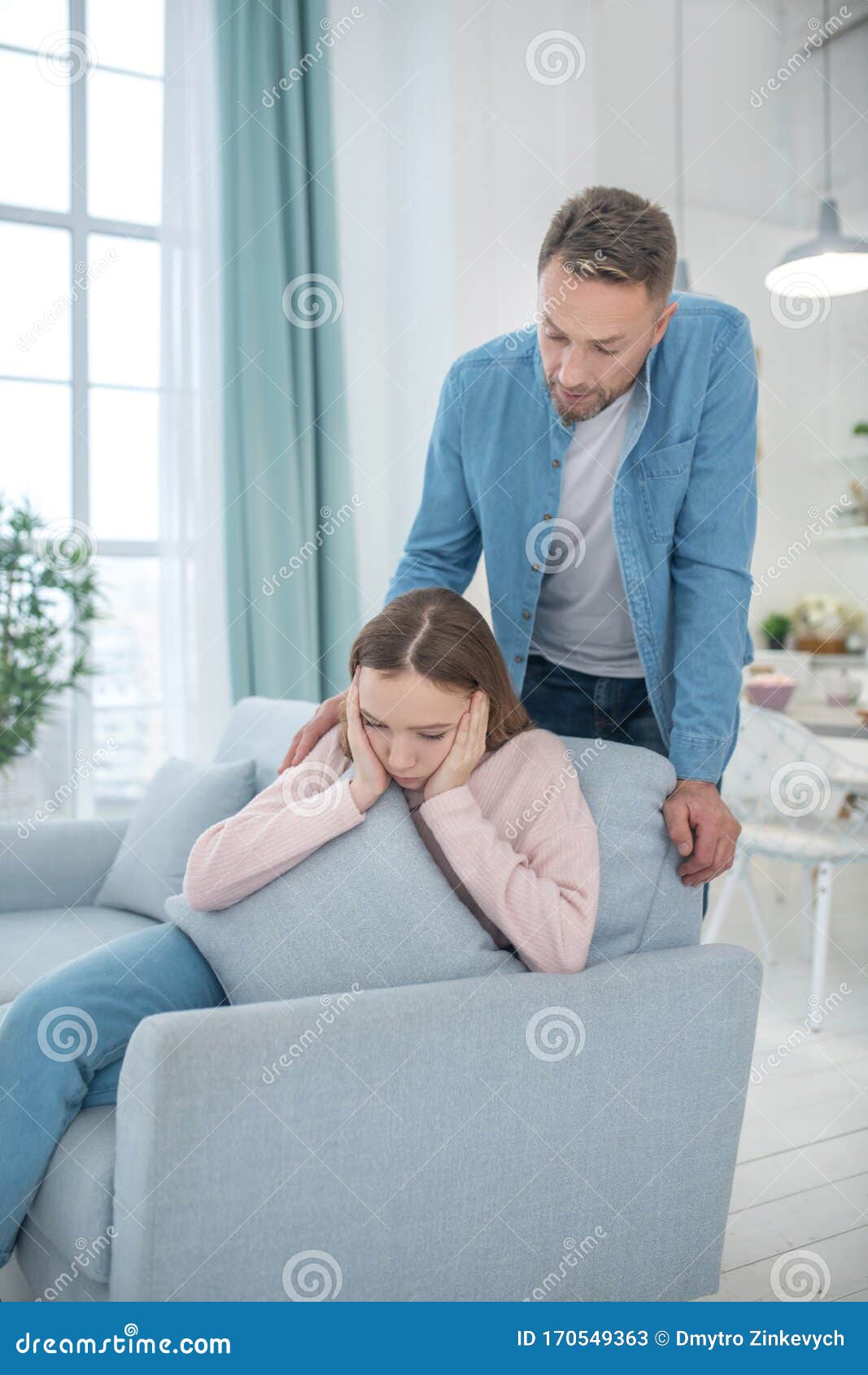 Father is Standing Behind the Back of Seated Daughter. Stock Image ...