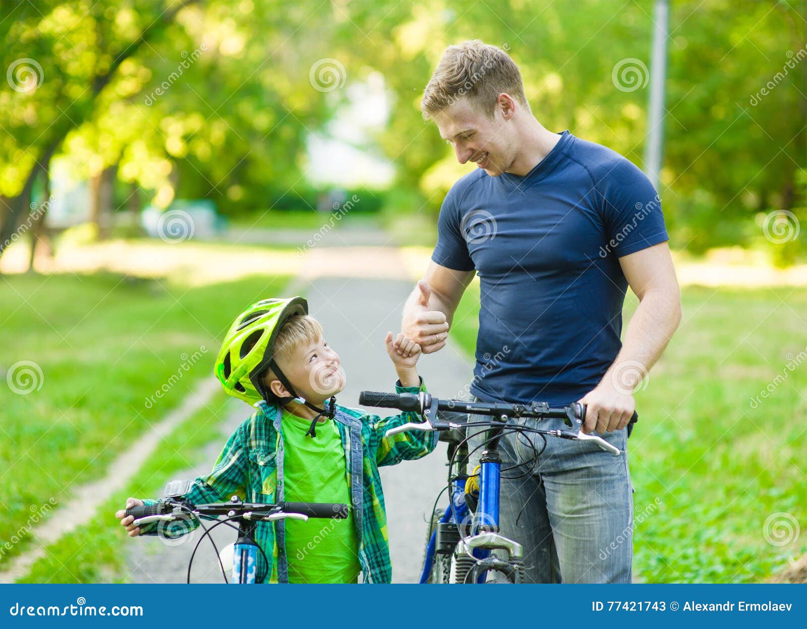 Father Talking with His Son Riding a Bicycle and Showing Thumb Up Stock ...