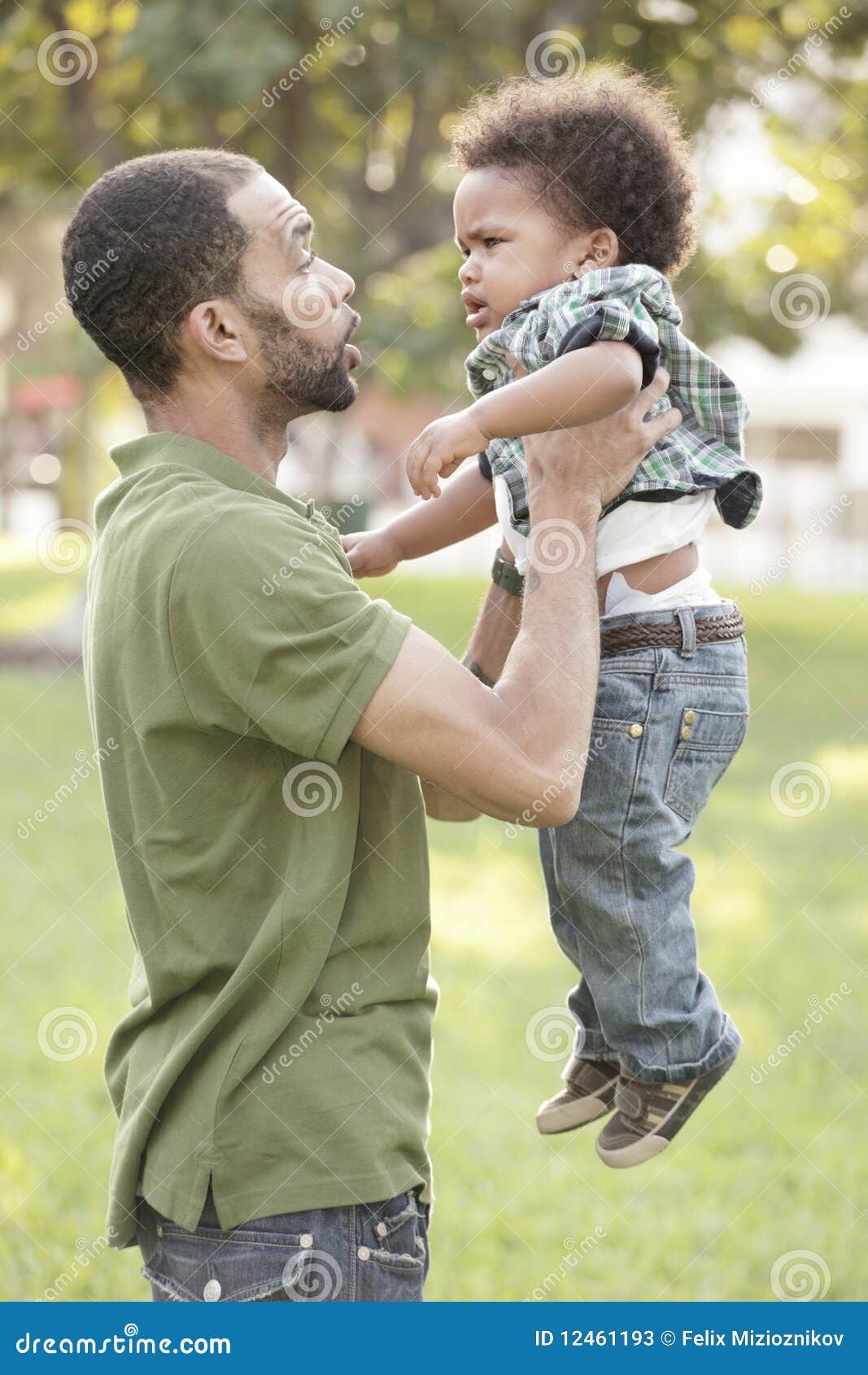 Father talking to his son stock image. Image of lifted - 12461193