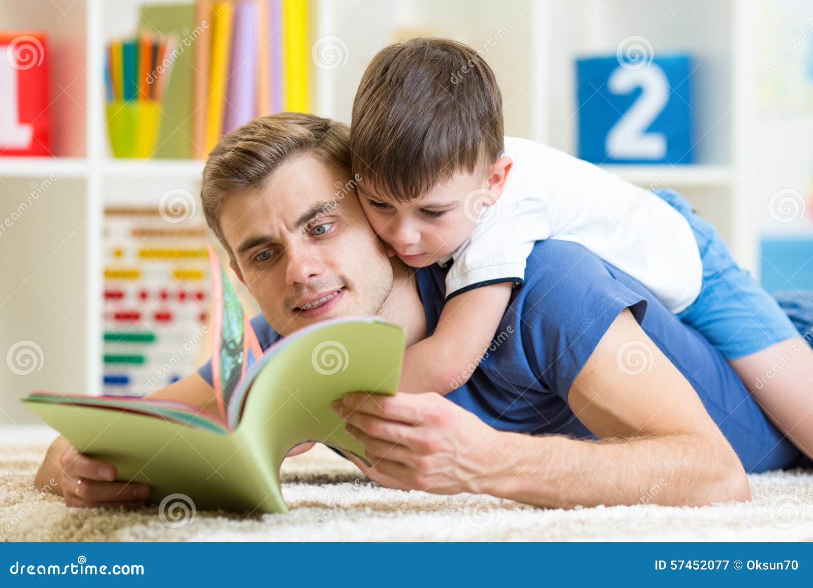 Father Teaches Reading Book To Kid Stock Image - Image of learn, indoor ...