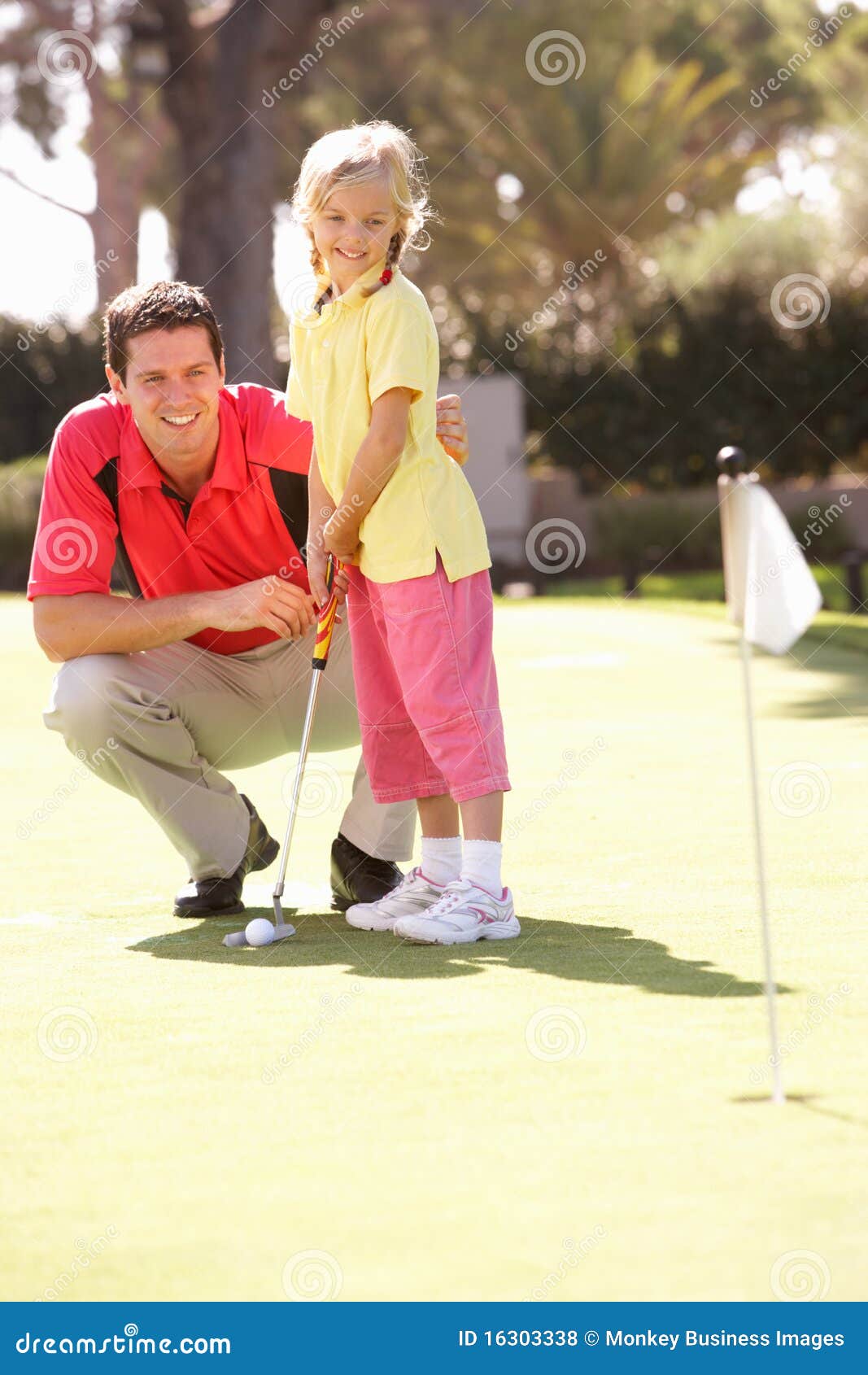 Father Teaching Daughter To Play Golf Stock Photo - Image of pastime ...