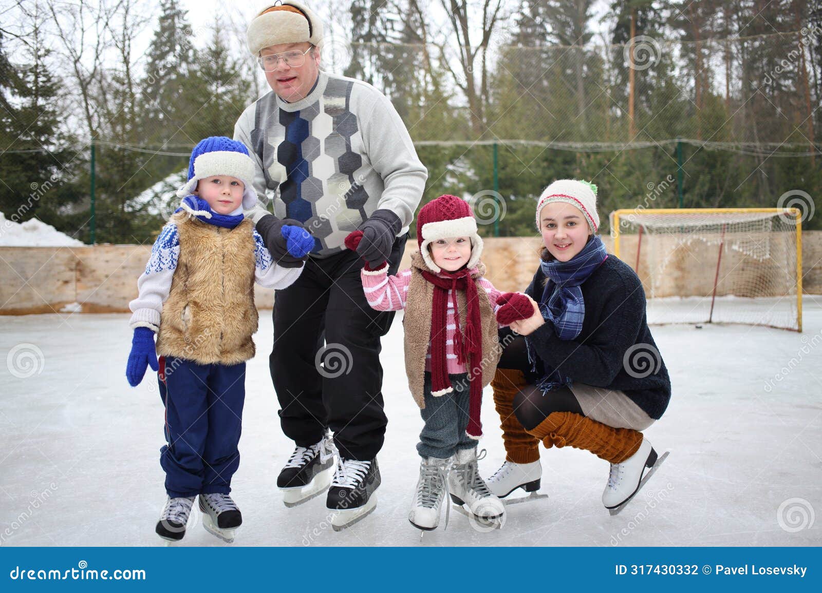 Father with Three Children Skating in Stock Photo - Image of grid ...