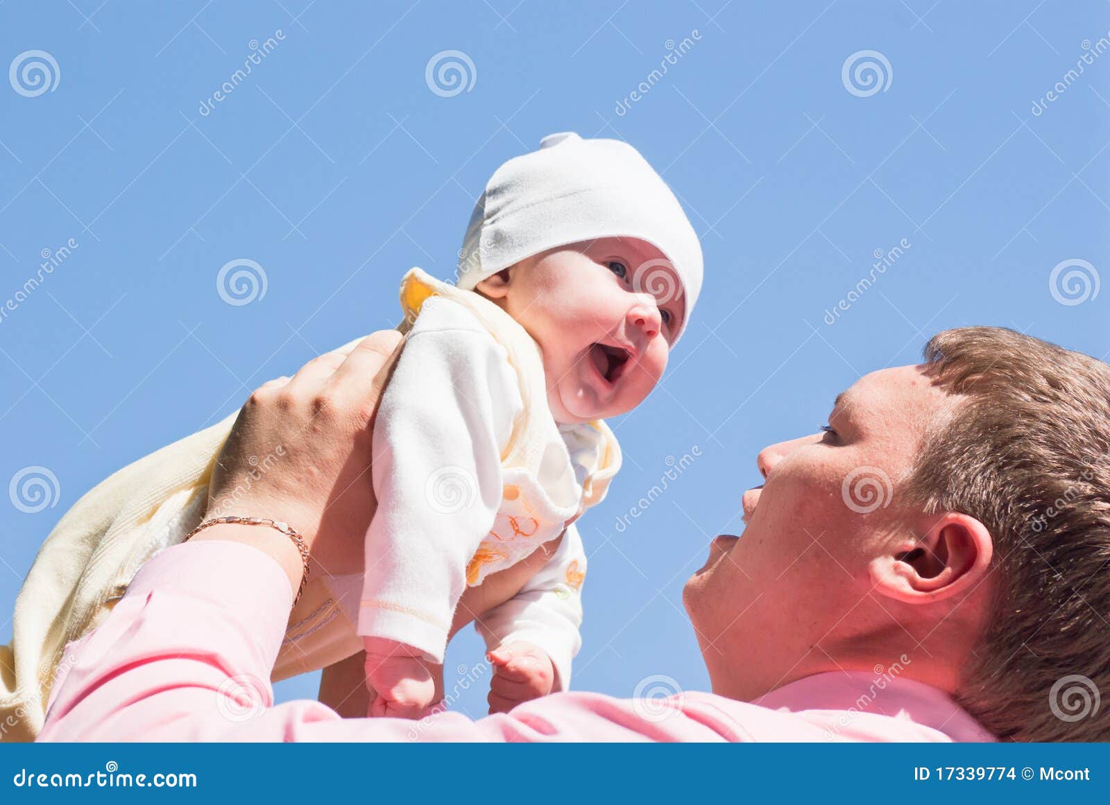 The Father Throws Up the Kid Upwards Stock Photo - Image of summer ...