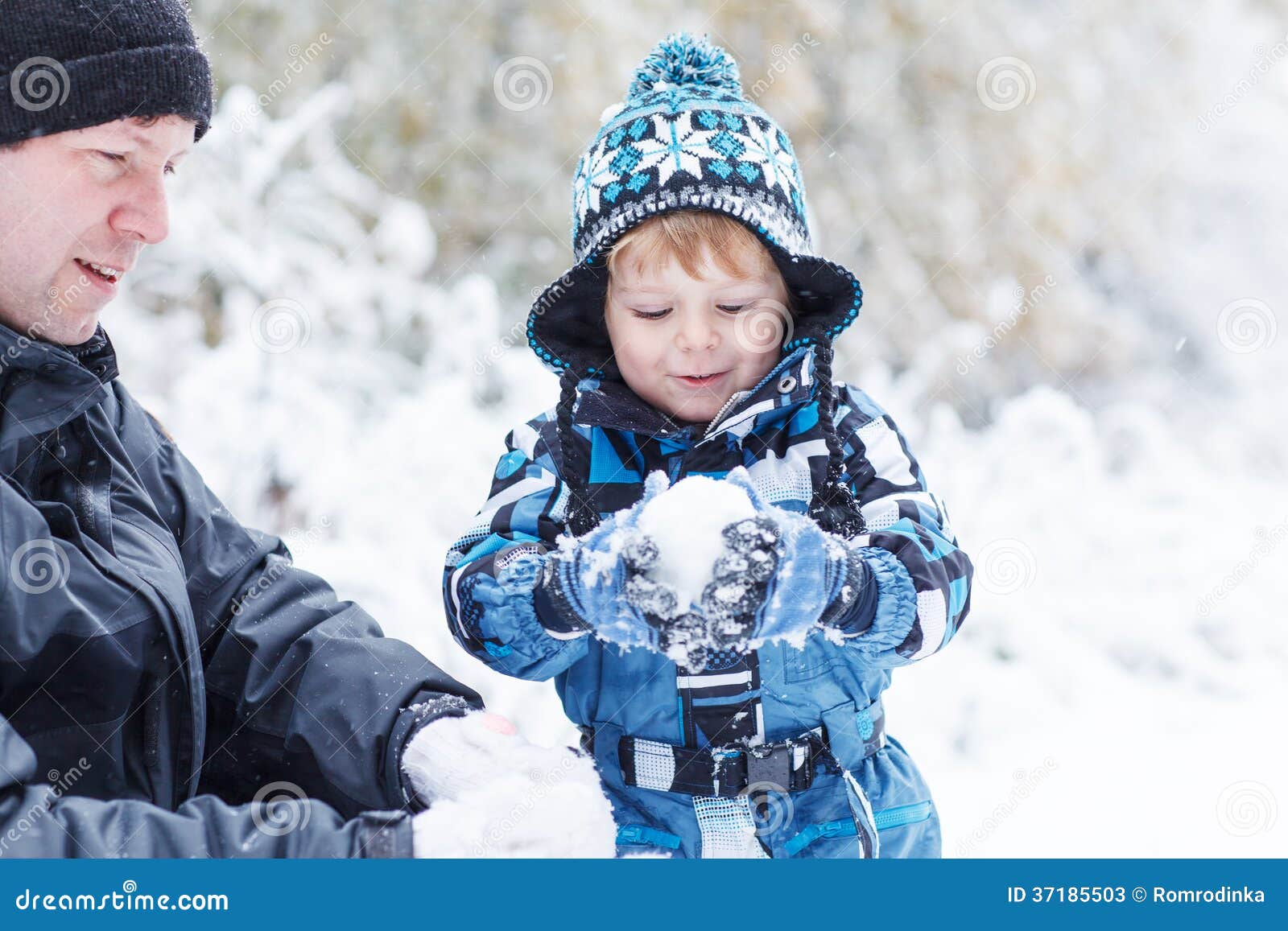 Father and Toddler Boy Having Fun with Snow on Winter Day Stock Image ...