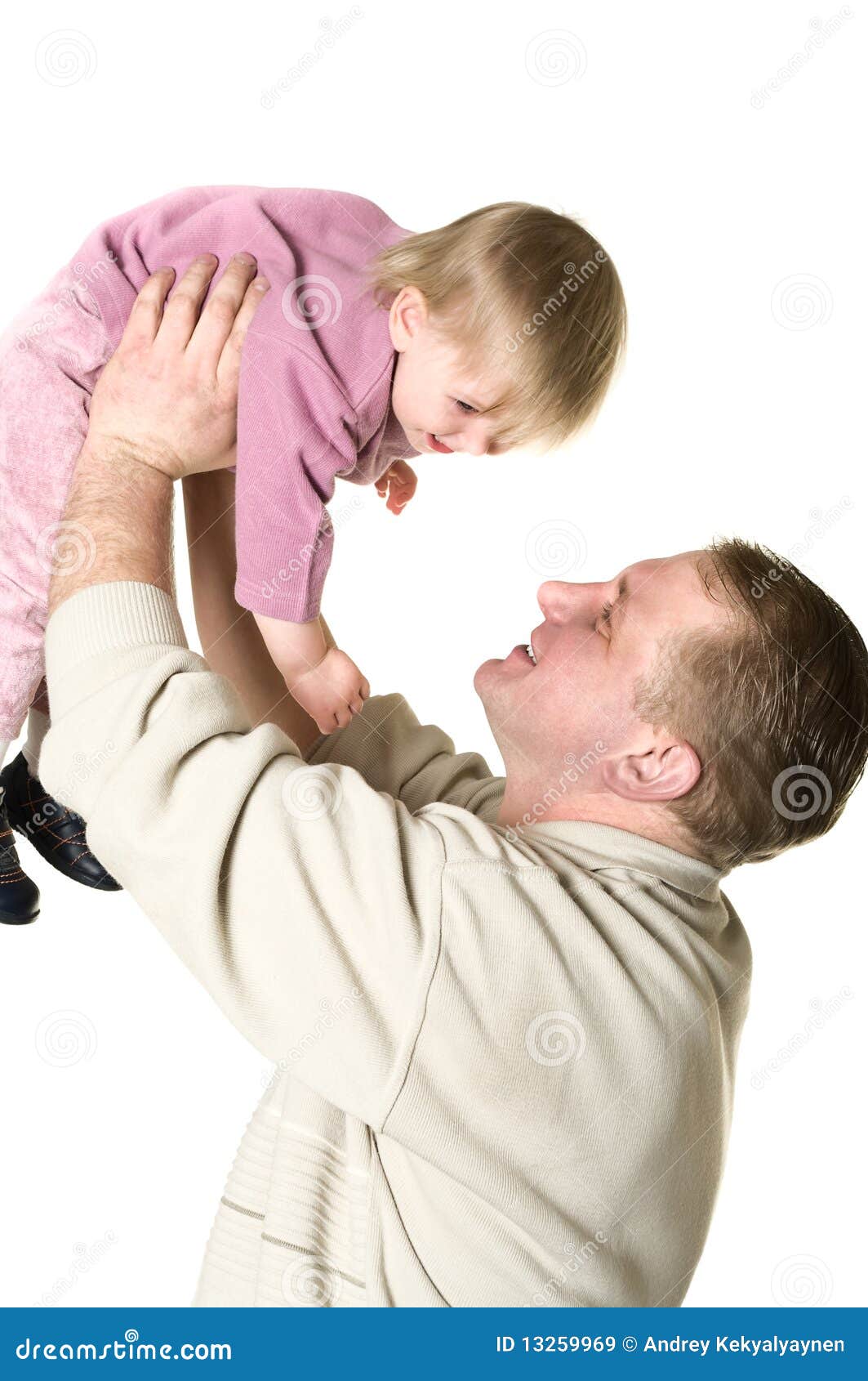 Father tossing up a child stock image. Image of expression - 13259969
