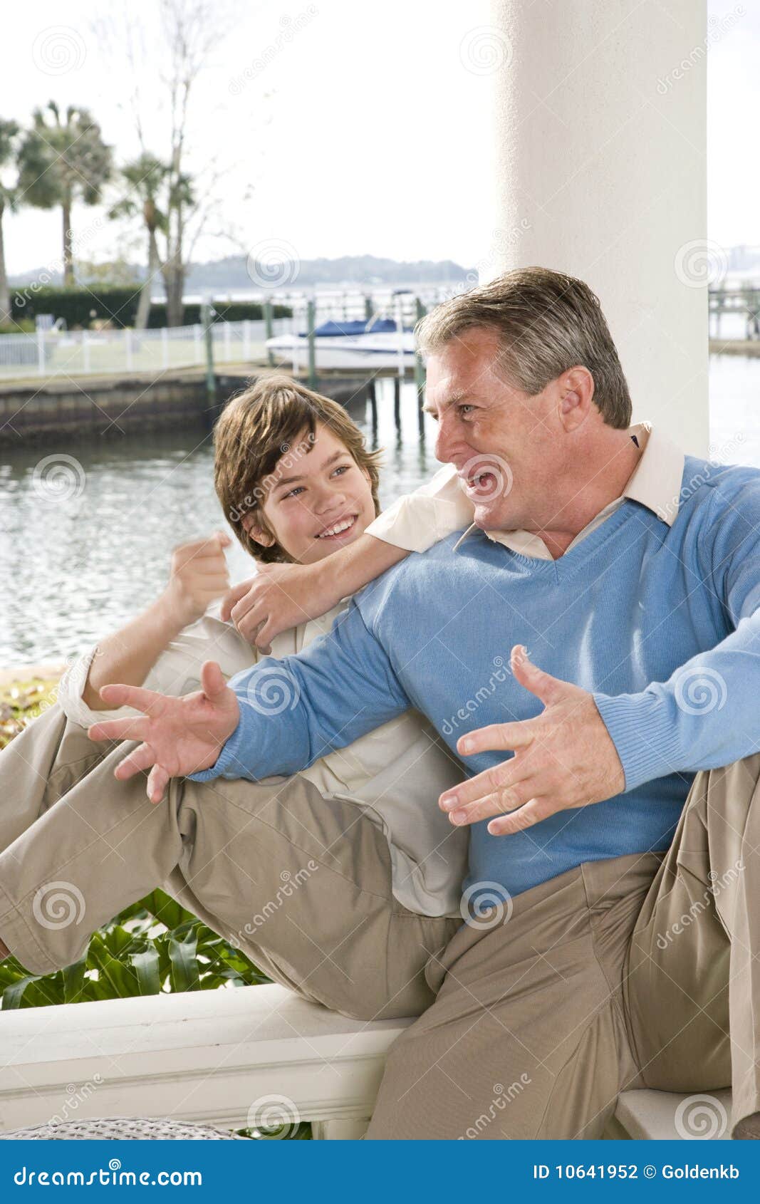 Father and Tween Son Talking Stock Photo - Image of palm, luxury: 10641952