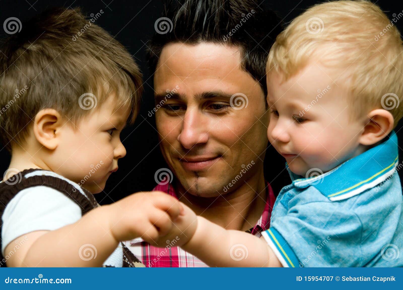 Father with two sons stock image. Image of parenthood - 15954707