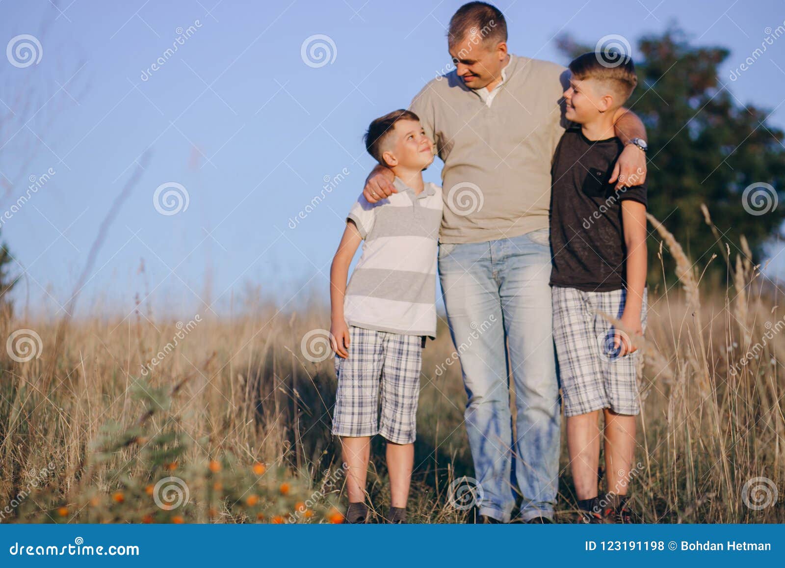 Father with two sons stock photo. Image of family, natural - 123191198