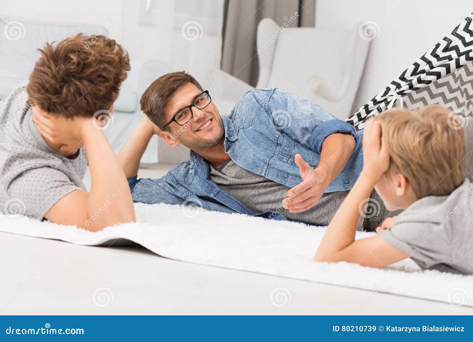 Father and two sons stock image. Image of listen, sons - 80210739