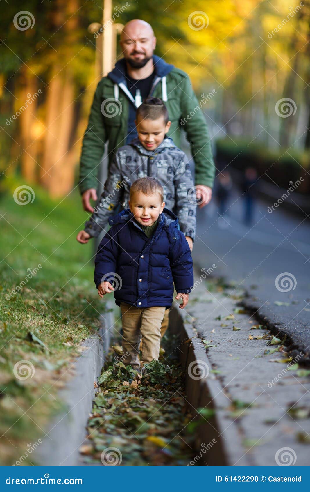 Father with two sons stock photo. Image of rankings, happy - 61422290