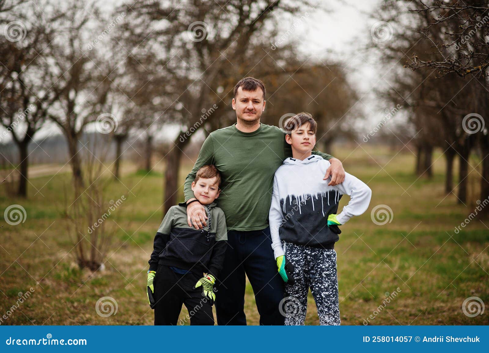 Father with Two Sons Working on Spring Garden Stock Image - Image of ...