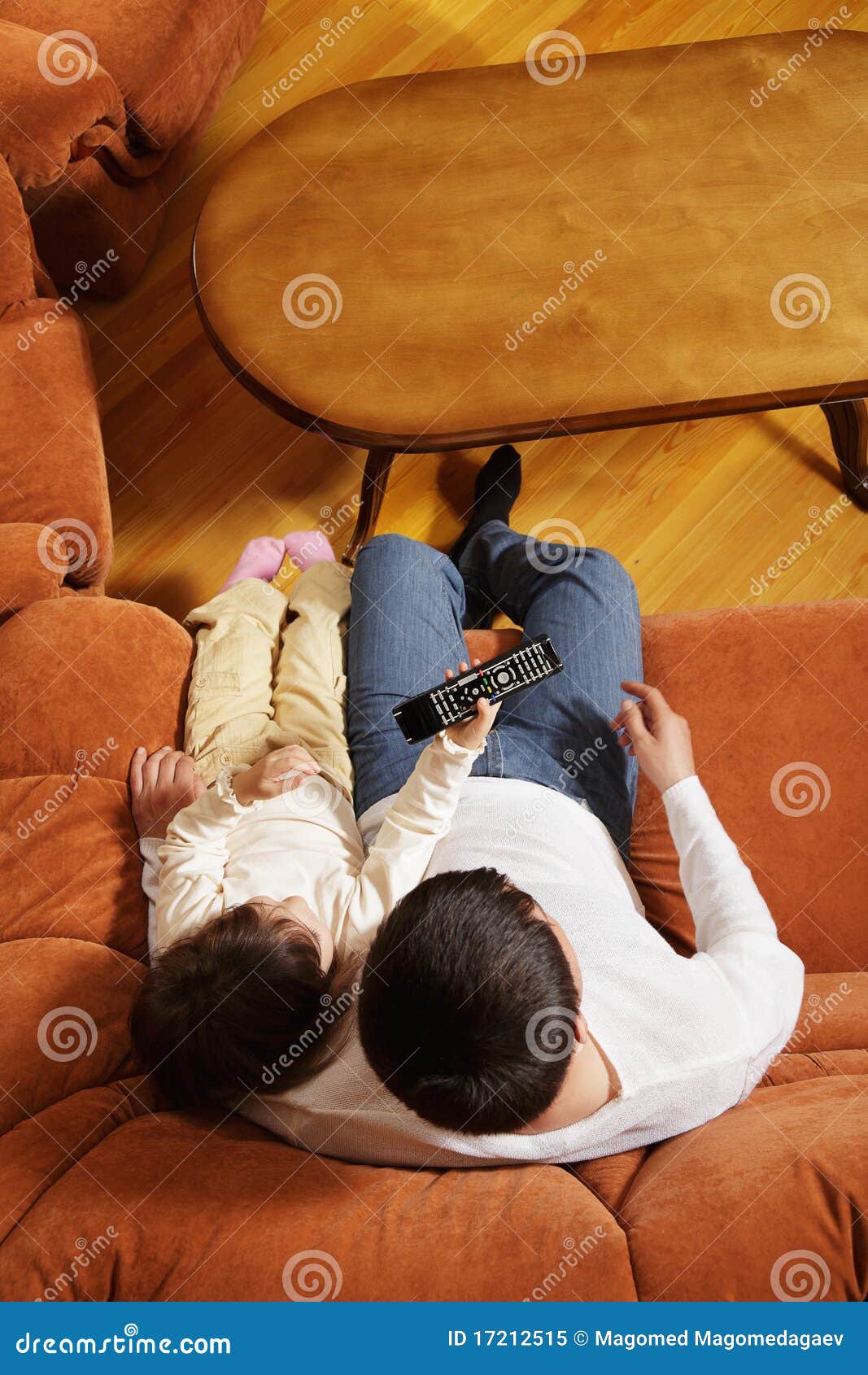 Father Watching His Two Children Walk Over Trees In A Forest Stock ...