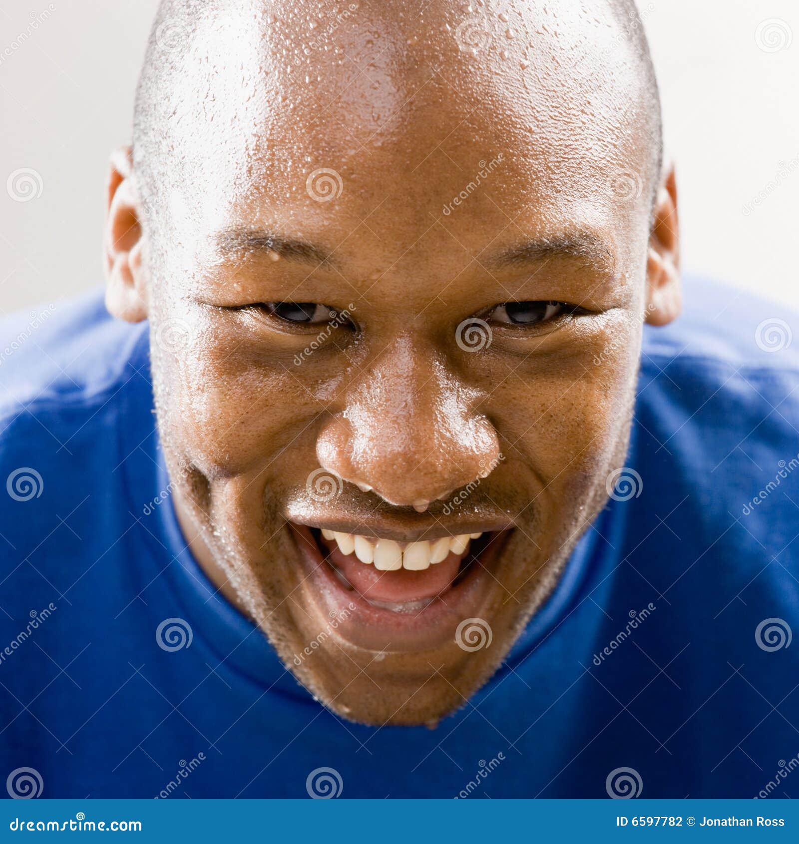Fatigued man smiling stock photo. Image of shoulders, focus - 6597782