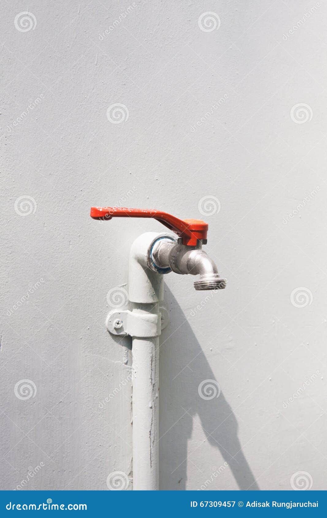 Faucet on the White Concrete Wall. Stock Image - Image of sink, drop ...