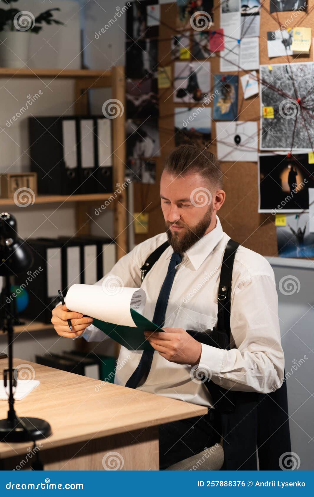 FBI Agent Analyzing Results of Expert Study while Having Working at ...