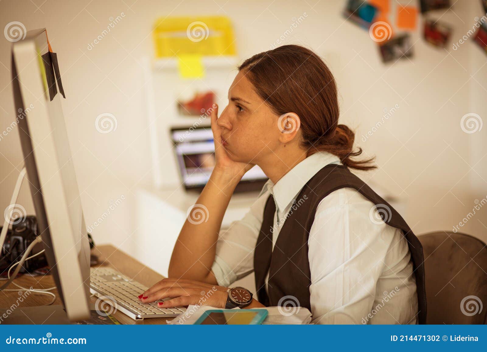 Female agent in office. stock photo. Image of determination - 214471302