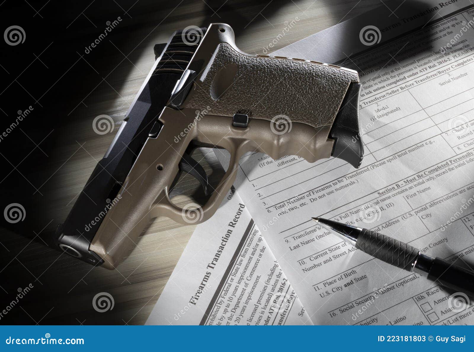 Fbi Nics Check Form That Is Public Domain With A Brown Polymer Handgun