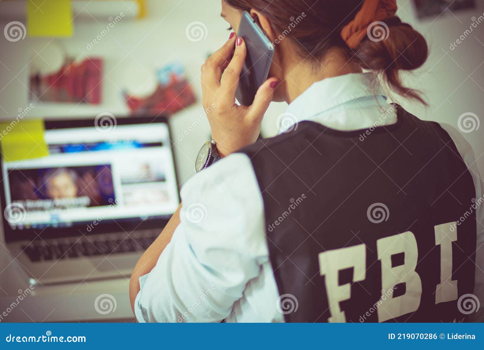 FBI Woman in Office Talking on Phone Stock Photo - Image of holding ...