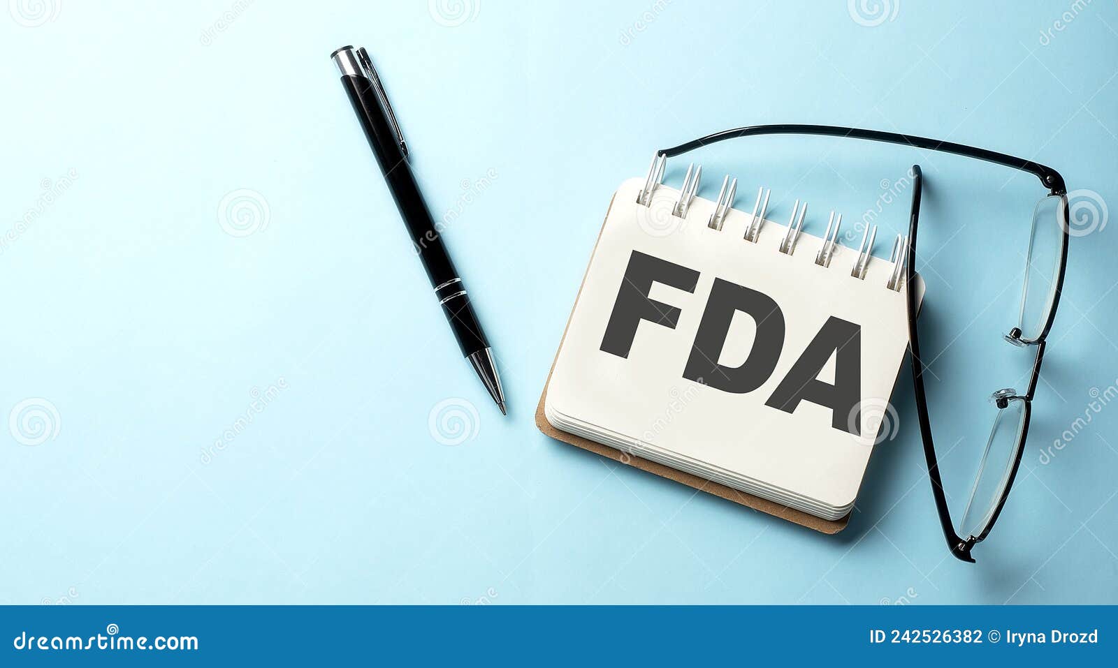 FDA Text Written on a Notepad on the Blue Background Stock Photo ...