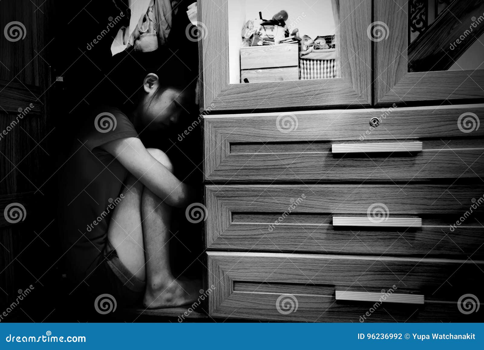 Fear girl hiding in closet stock photo. Image of adult - 96236992