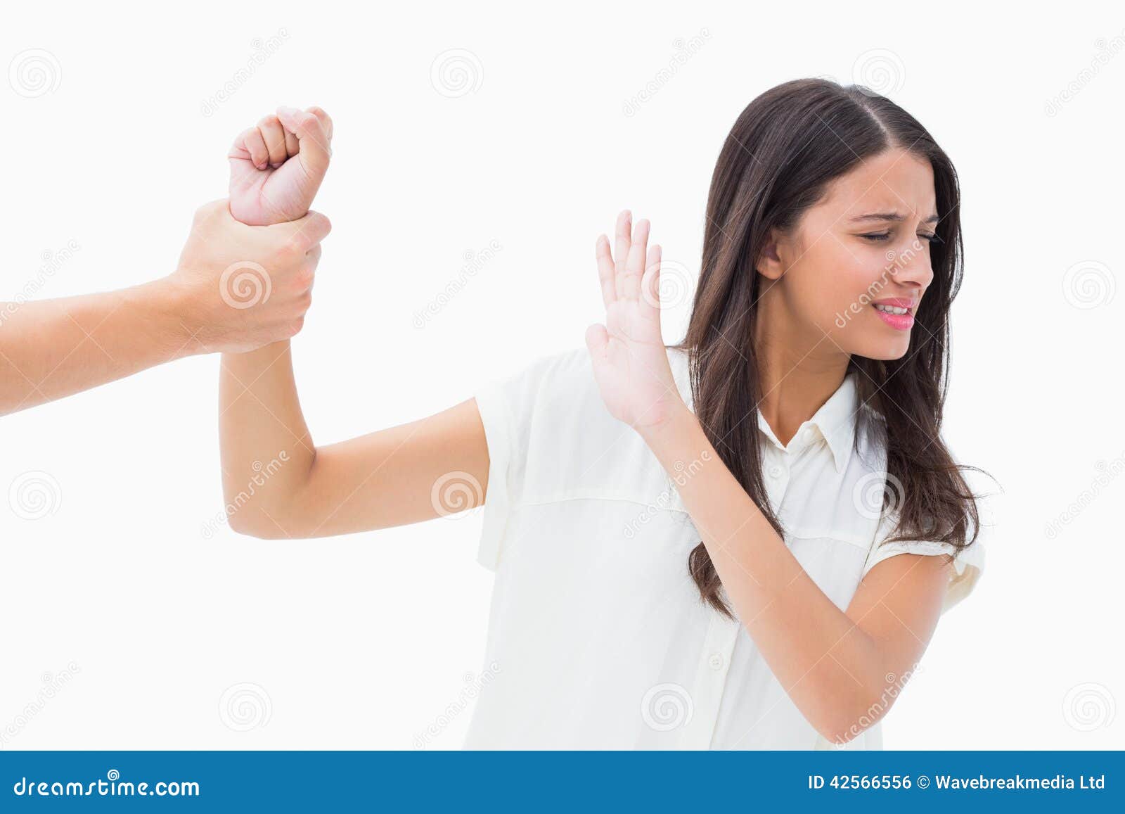 Fearful Brunette Being Grabbed by the Hand Stock Photo - Image of head ...