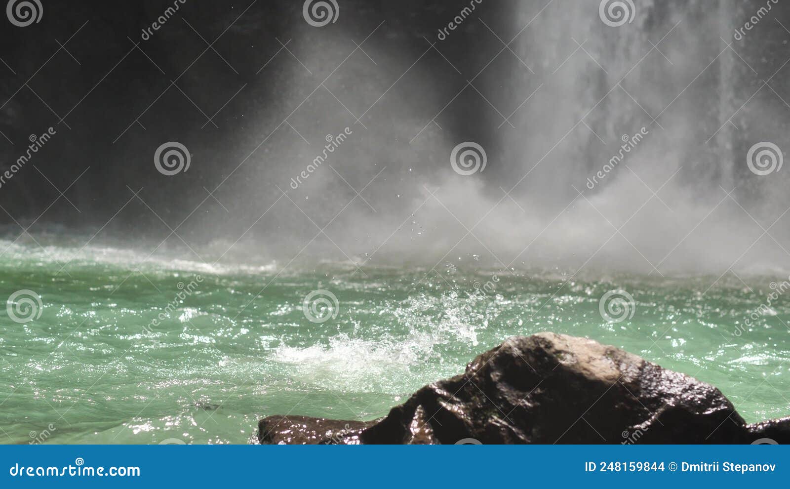 Fearless Young Man Diving into the Stream on the Foot of a Powerful ...