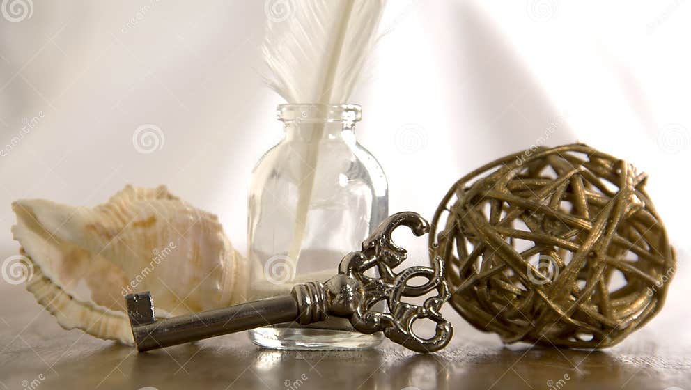 Feather,Key,Sea Shell stock photo. Image of abstract - 45688242