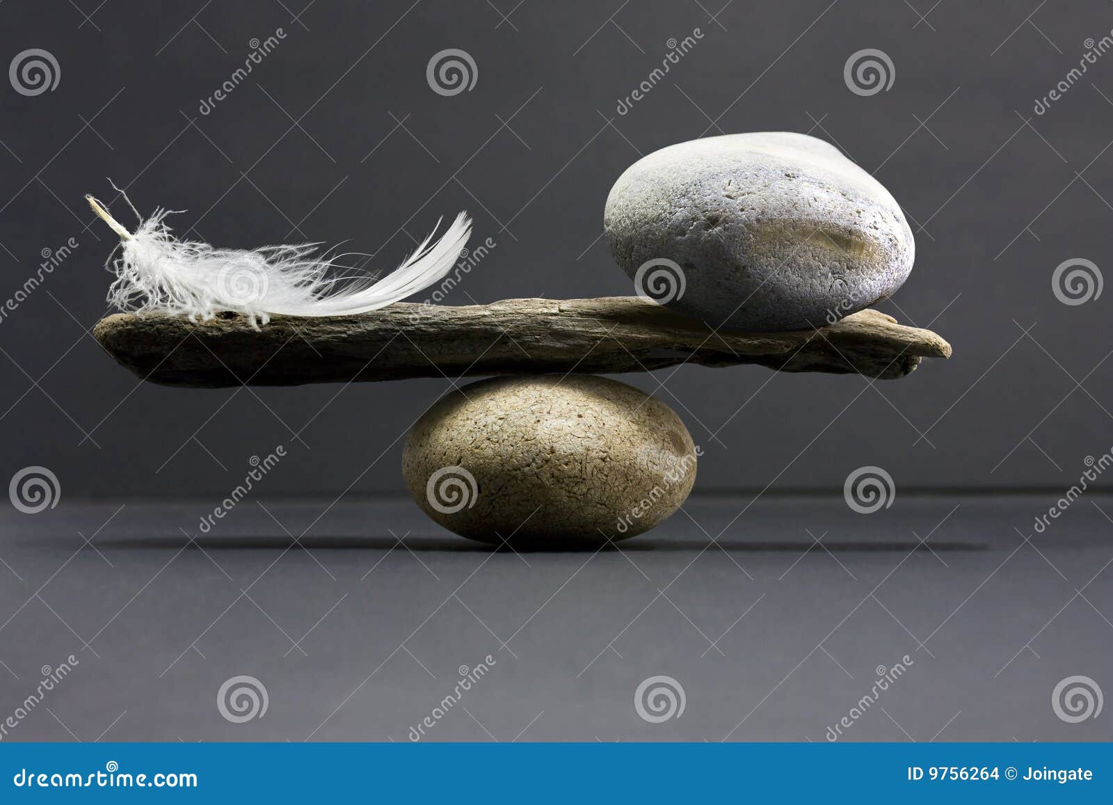 Feather and stone balance stock photo. Image of balance - 9756264