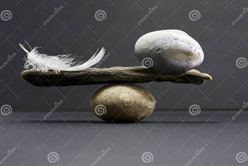 Feather and stone balance stock photo. Image of balance - 9756264