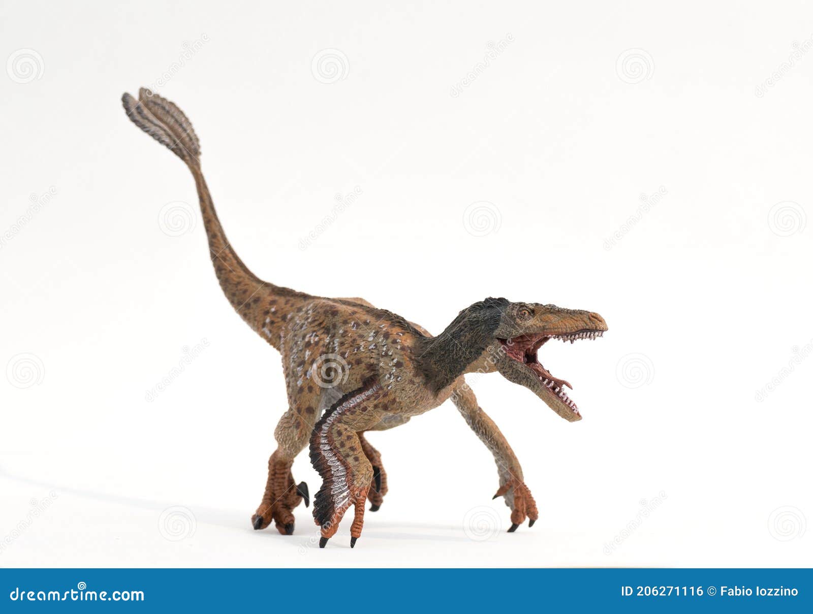 Feathered Velociraptor With Open Mouth In Jurassic Land With Volcano In ...