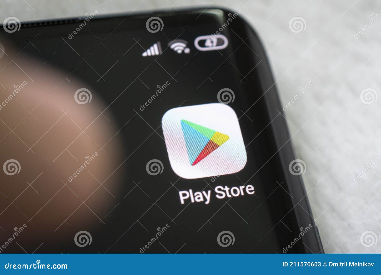 Google Play Store App on the Screen of a Black Smartphone Editorial ...
