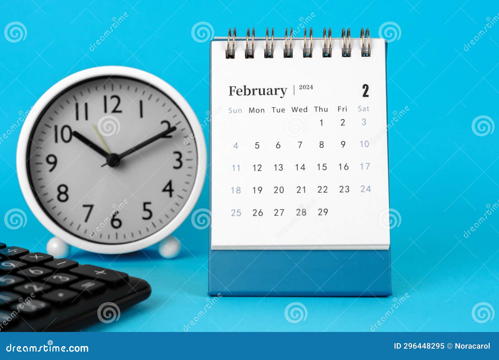 February 2024 Desk Calendar on Blue Background Stock Image - Image of ...
