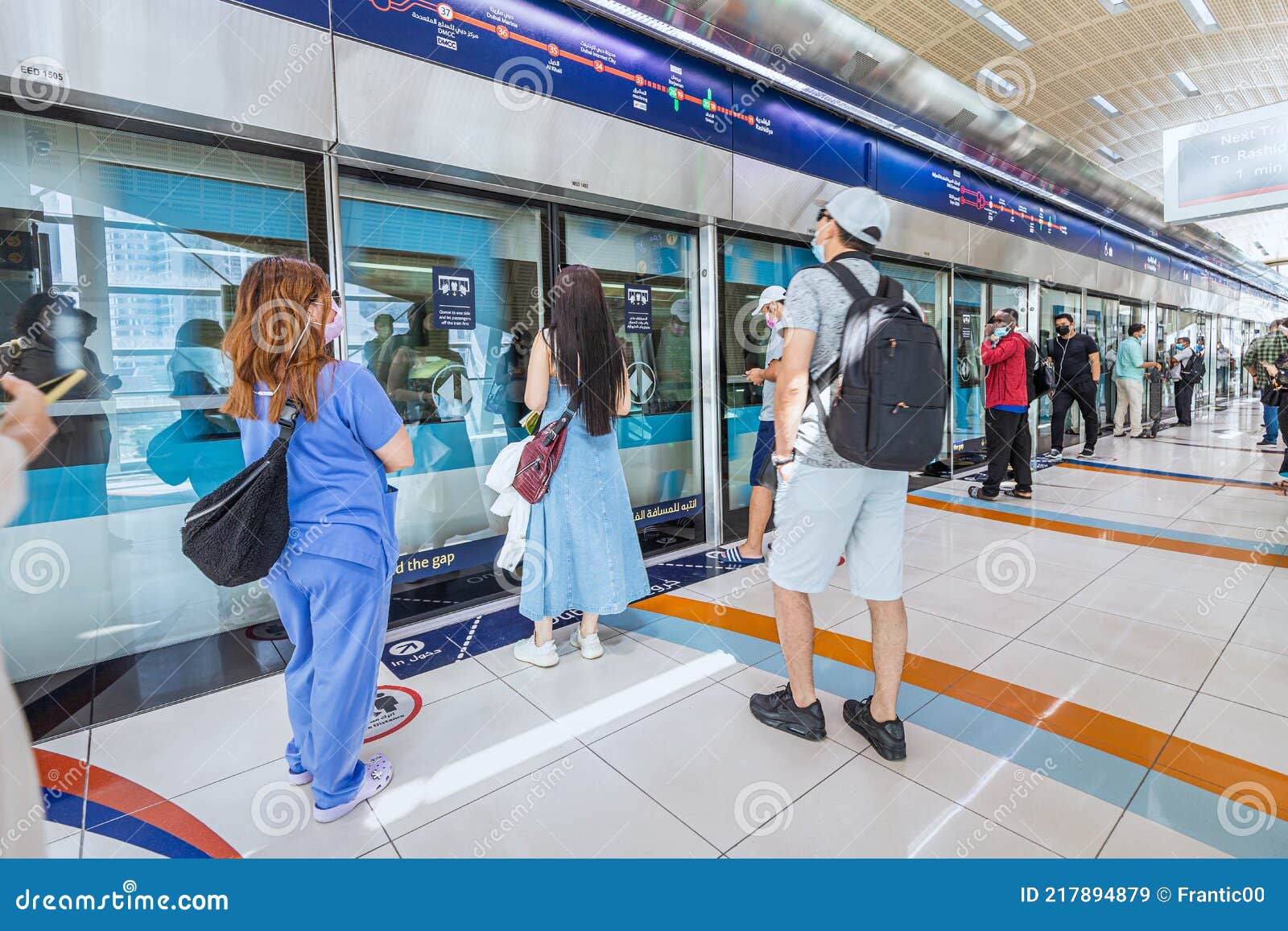 Passengers Enter the Arriving Train Car in the Metro Editorial Stock ...