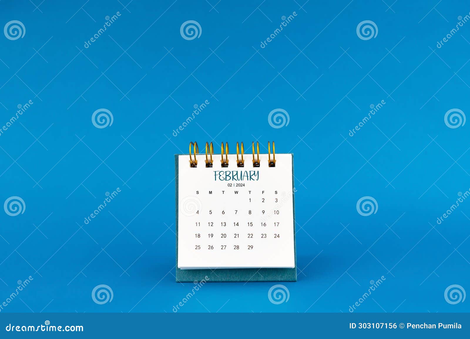February 2024 Mini Desk Calendar on Blue Background Stock Photo - Image ...