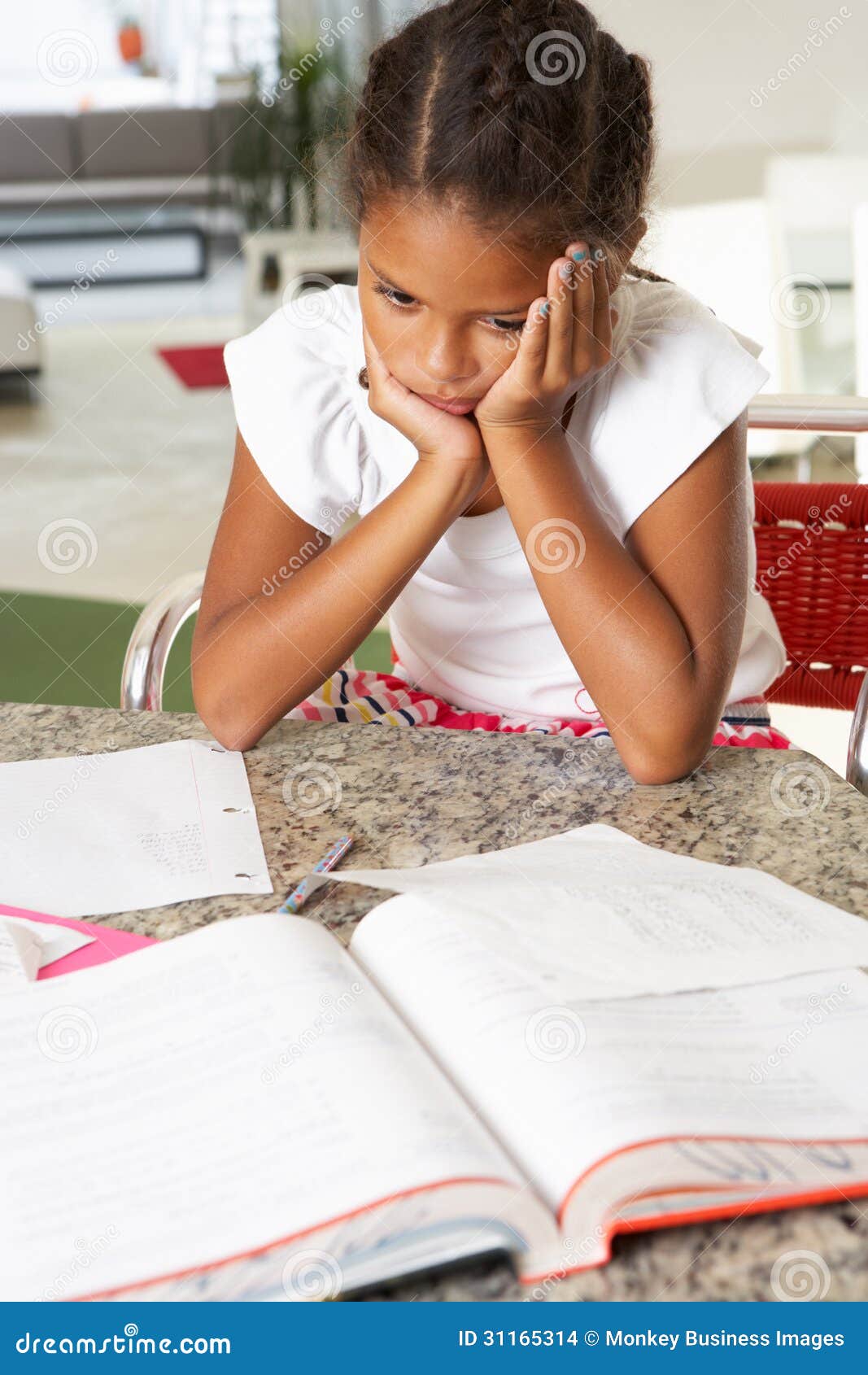 Fed Up Girl Doing Homework stock photo. Image of hands - 31165314