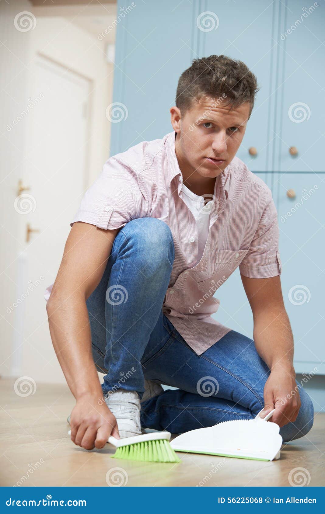 Fed Up Man Sweeping Floor with Dustpan and Brush Stock Photo - Image of ...