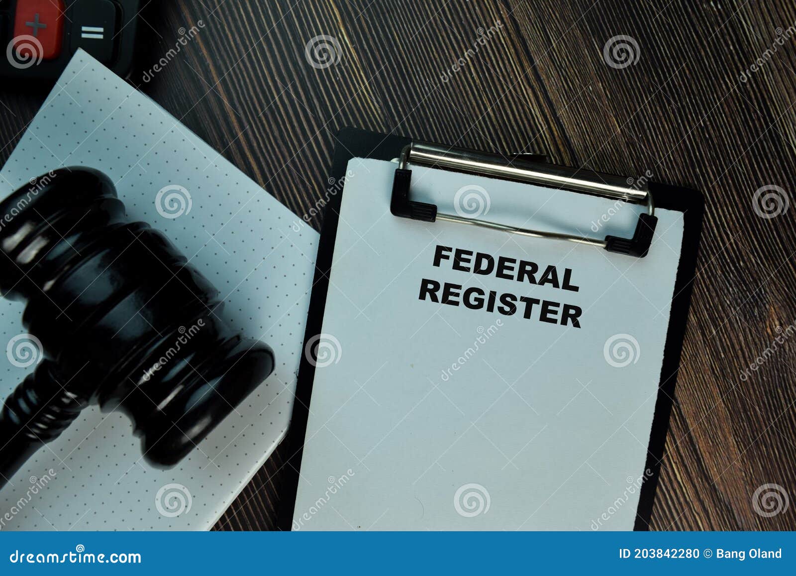 Federal Register Write on a Paperwork Isolated on Wooden Table ...
