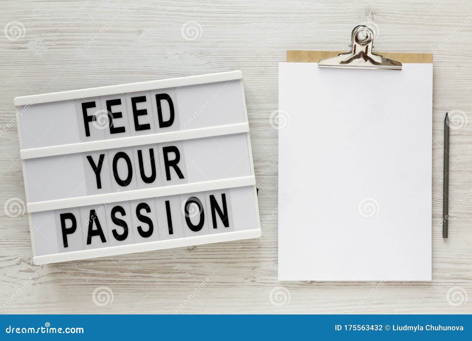 `feed Your Passion` Words On A Modern Board Clipboard With Blank Sheet Of Paper On A White