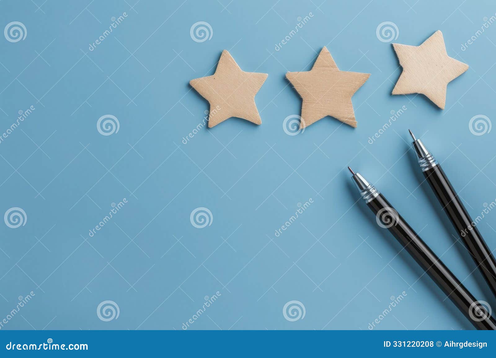 Customer Feedback Form with Wooden Stars and Pens on a Blue Backdrop ...