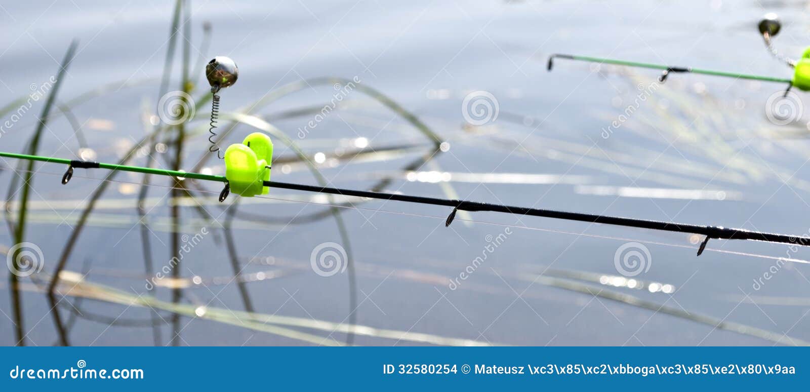 Feeder Method in Fishing and Bells on the Rods Tips Stock Photo - Image ...
