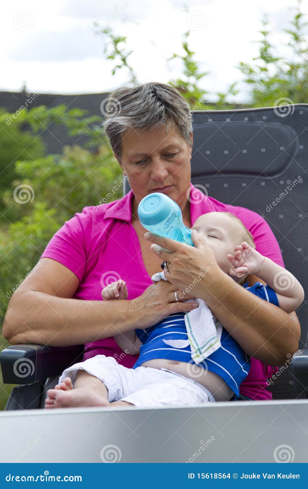 Feeding the baby stock photo. Image of innocence, birth - 15618564