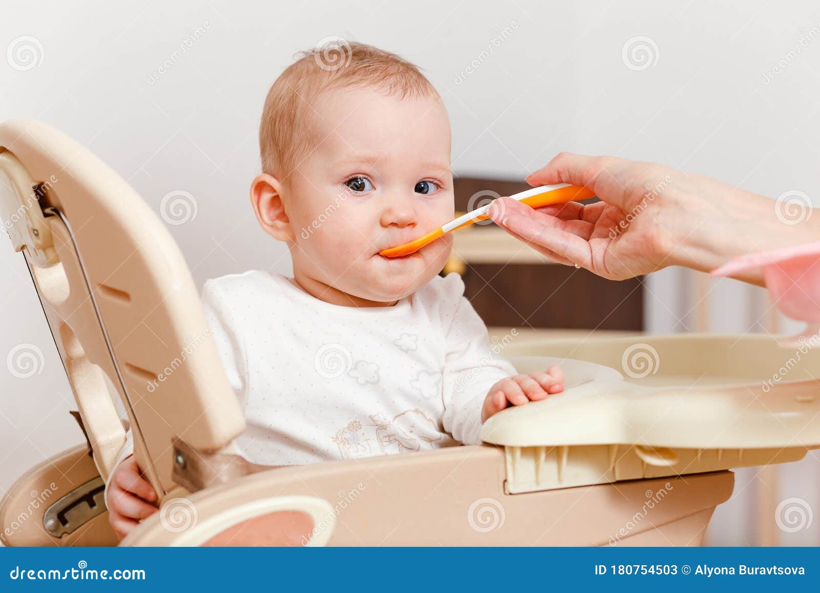 Feeding the Baby with a Spoon Stock Image - Image of caucasian, female ...