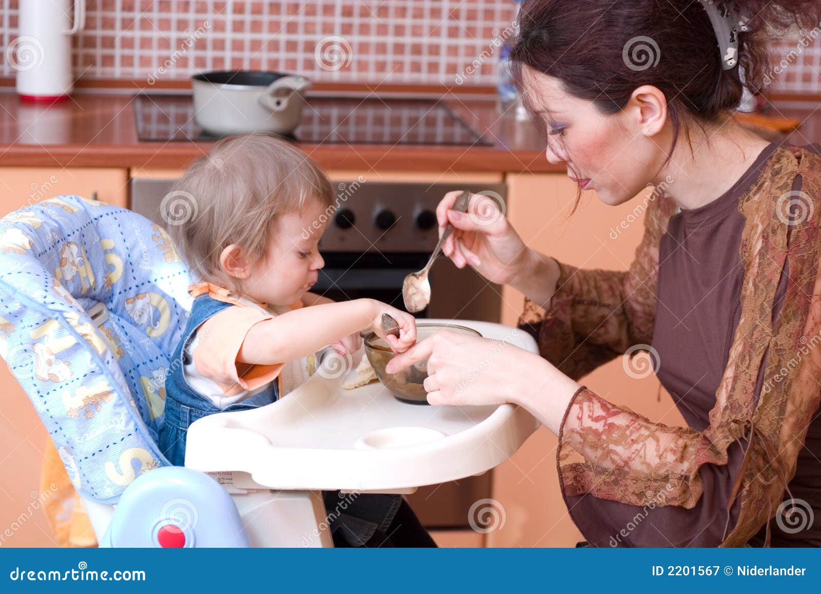Feeding a child stock image. Image of eating, people, small - 2201567