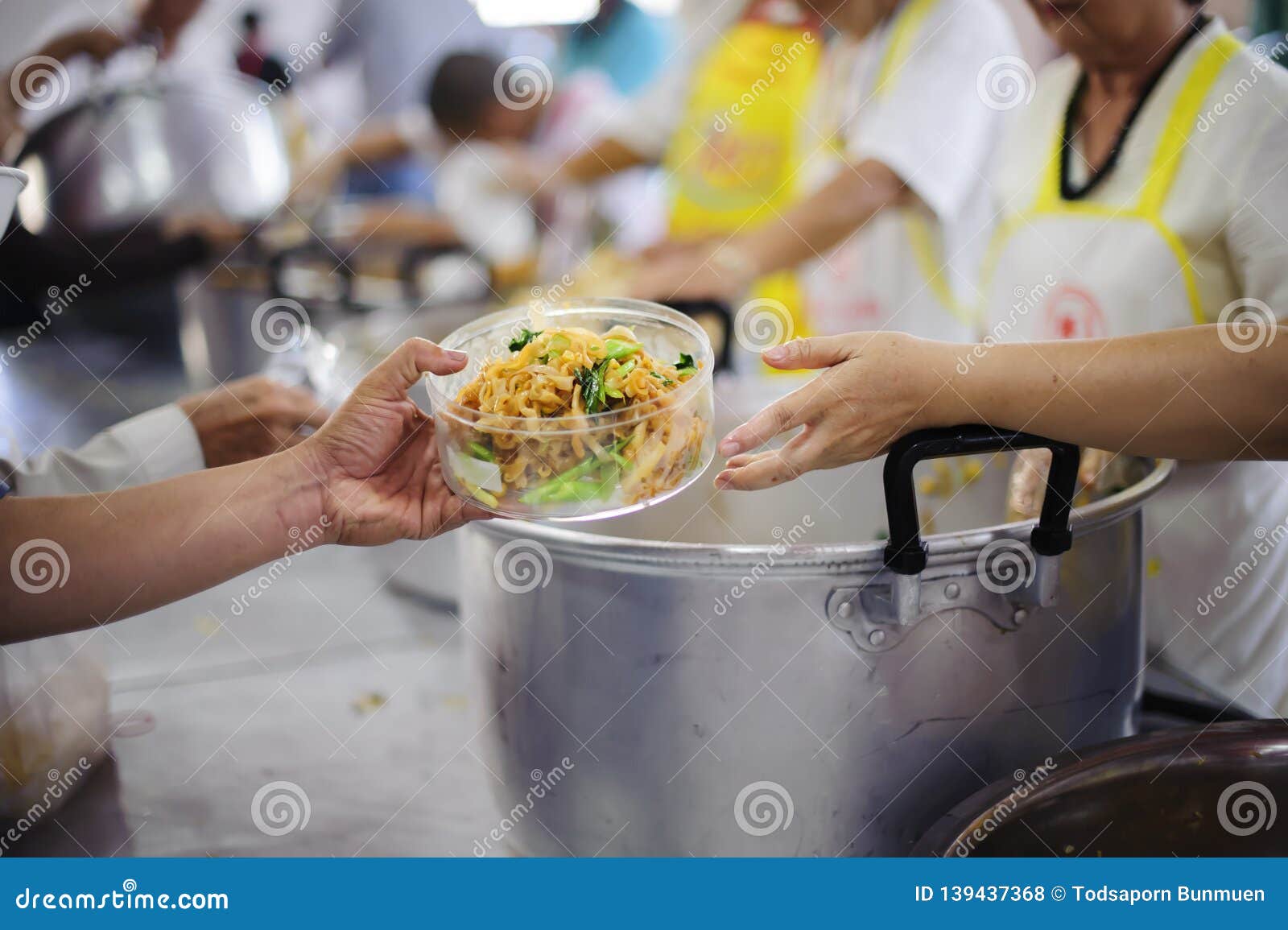 Feeding Helps Eliminate the Hunger of Many People Stock Photo - Image ...