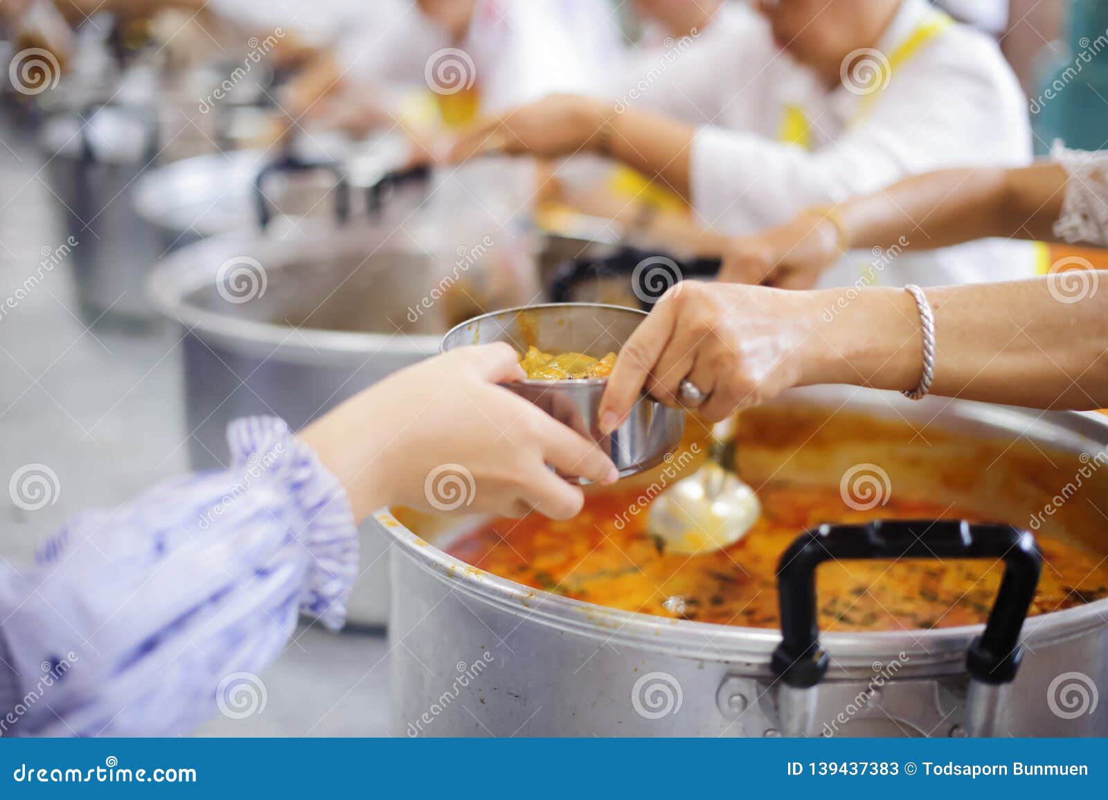 Feeding Helps Eliminate the Hunger of Many People Stock Image - Image ...