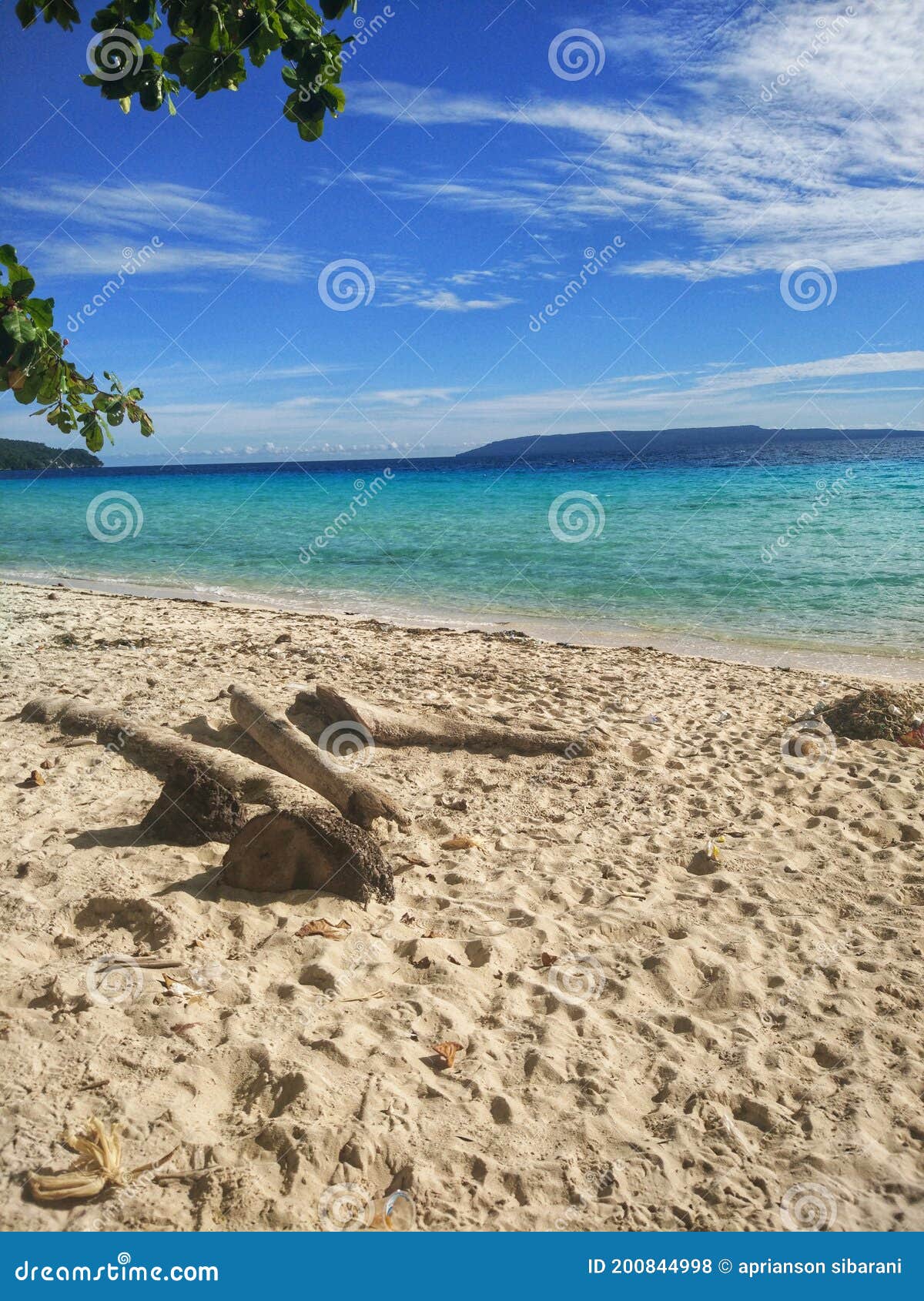 White sand and calm wave stock photo. Image of breeze - 200844998