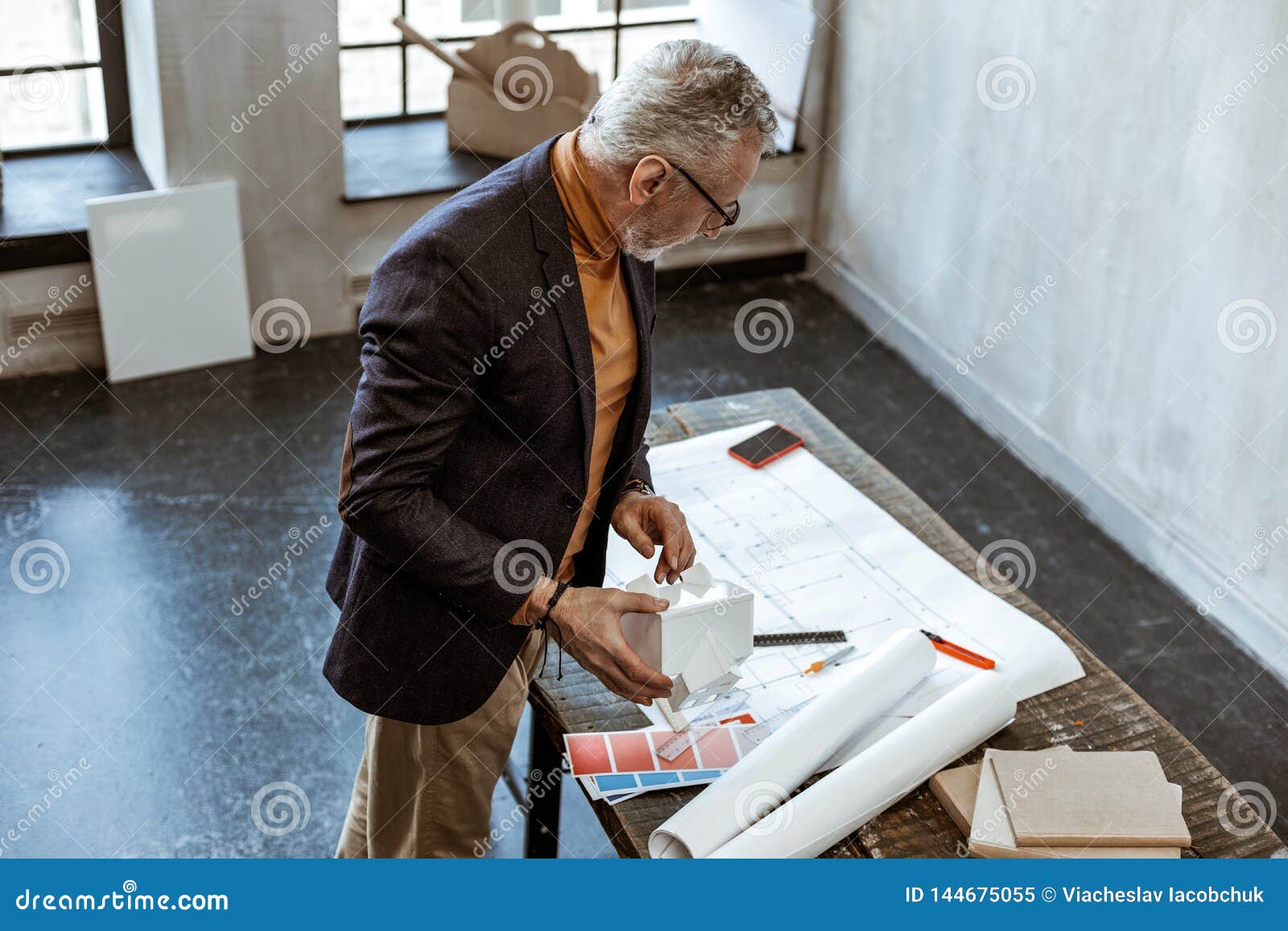 Interior Designer Feeling Busy while Thinking about New Plan Stock ...